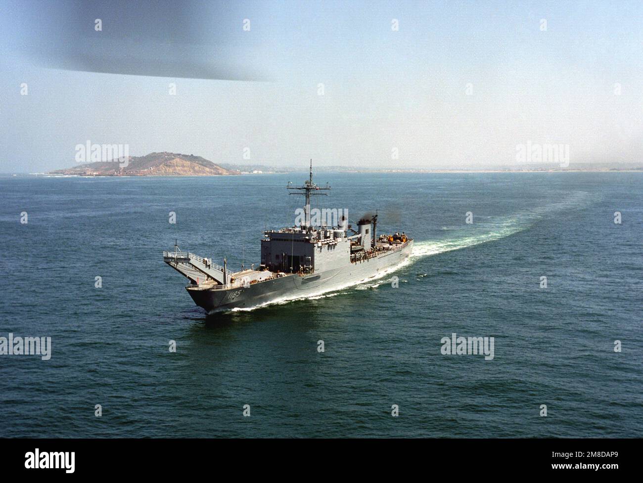 An aerial portside view, of the US Navy (USN) Newport Class Tank ...