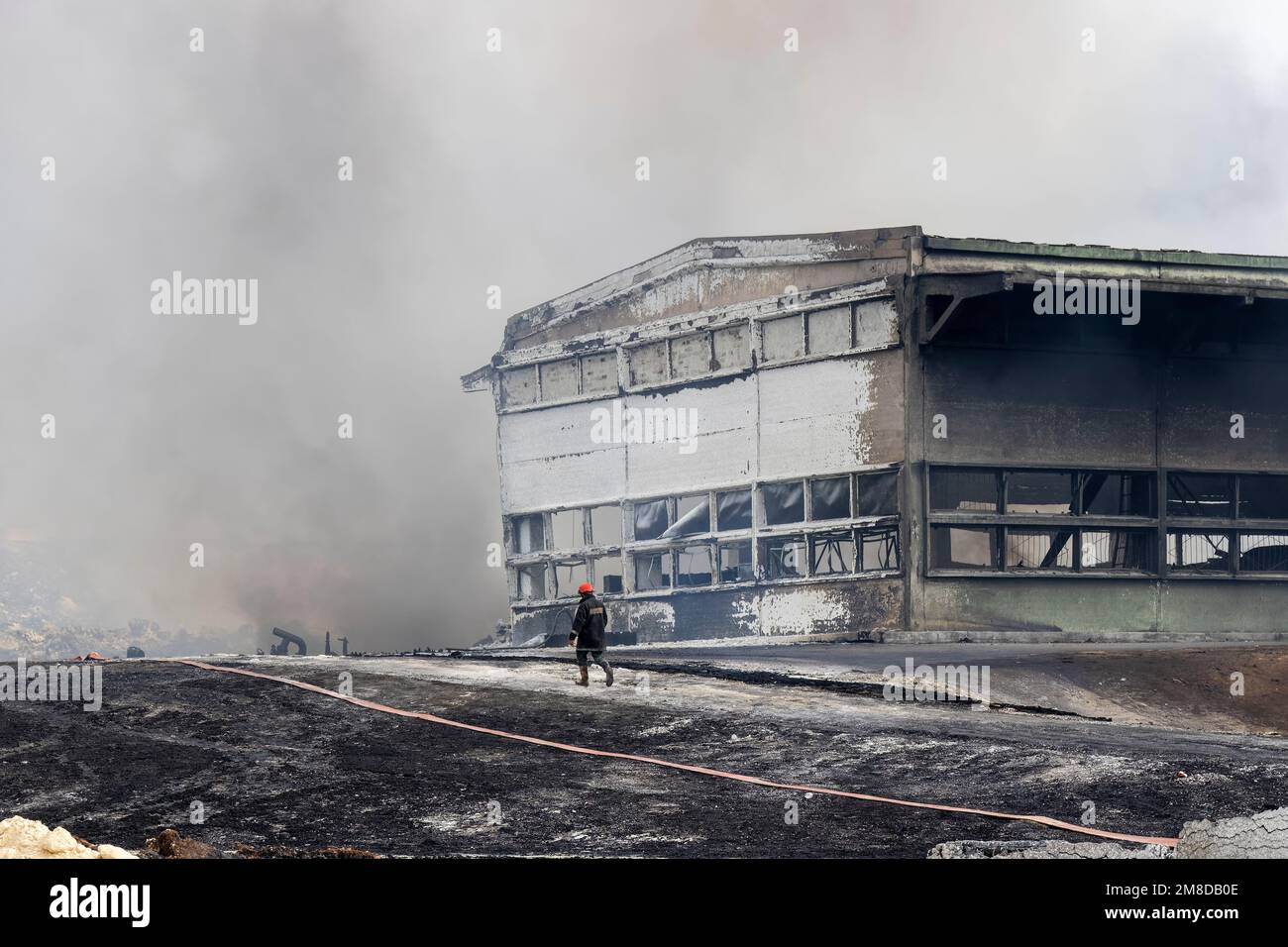 A firefighter on site, after the explosion of the oil tanks of the ...