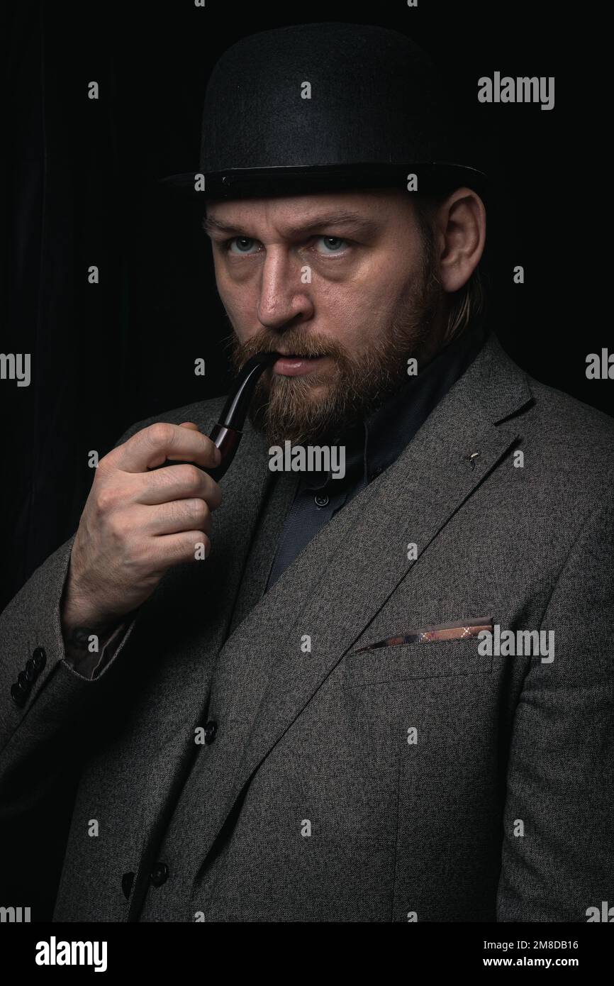 stylish man in retro outfit suit hat smoking wooden pipe sherlock ...