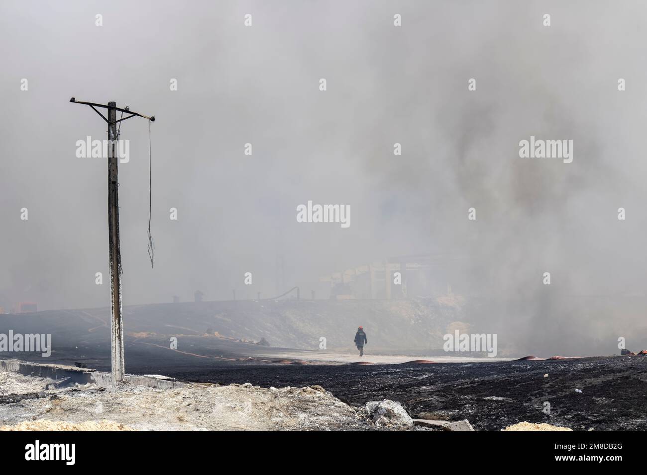 A firefighter on site, after the explosion of the oil tanks of the ...