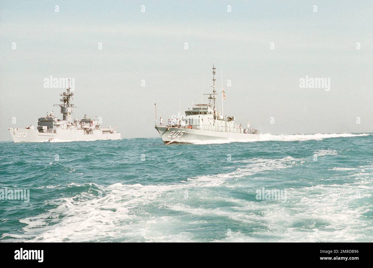 The Royal Australian Navy large patrol craft HMAS TOWNSVILLE (205) and ...