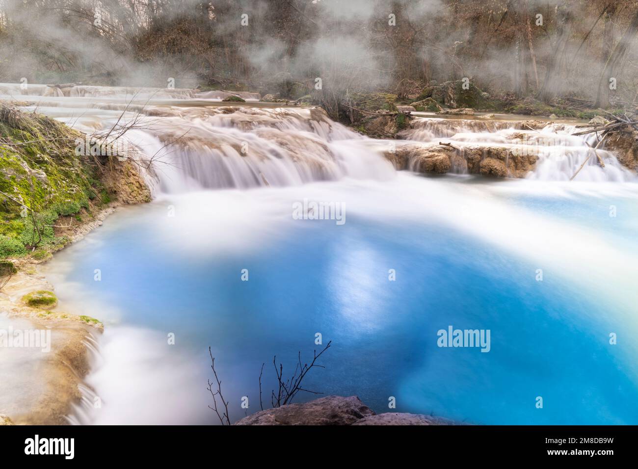 multiple waterfalls produced by the tuscan elsa river with forest ...