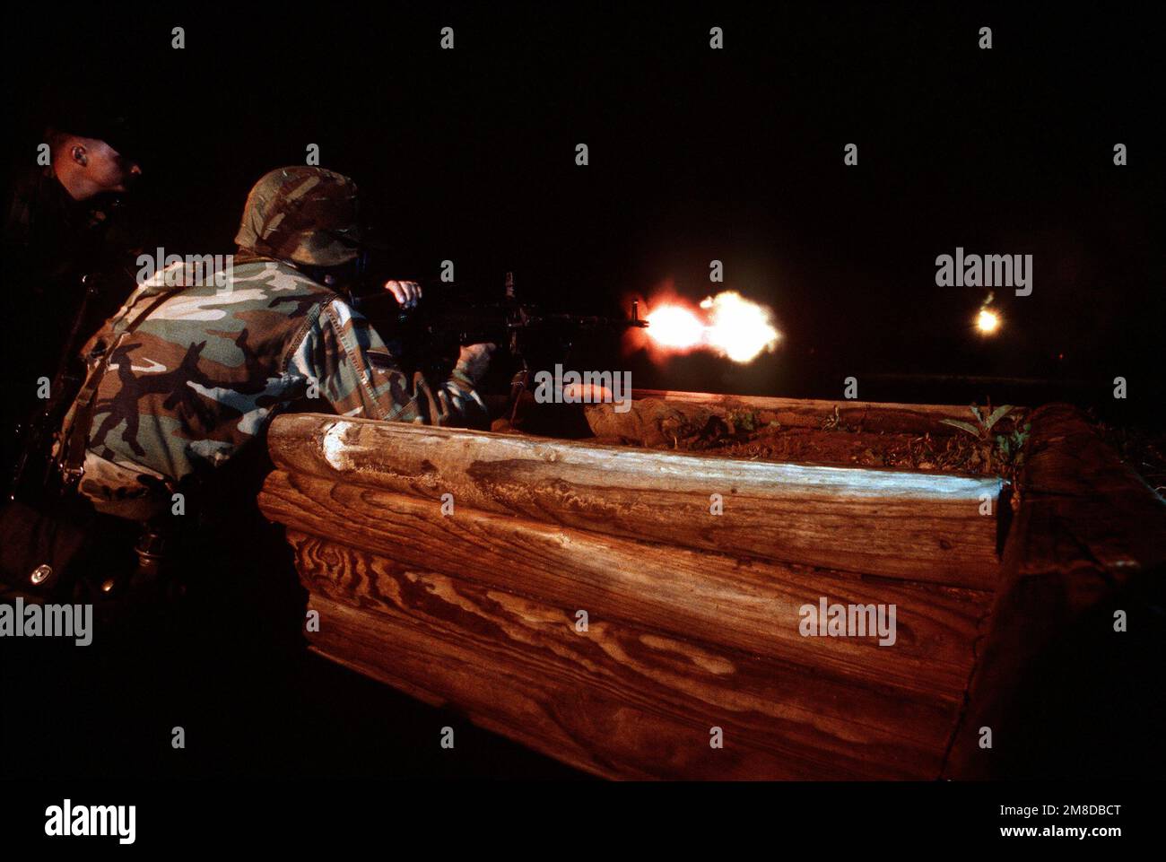 AIRMAN 1ST Class Bill Isola fires an M60 machine gun during a night ...