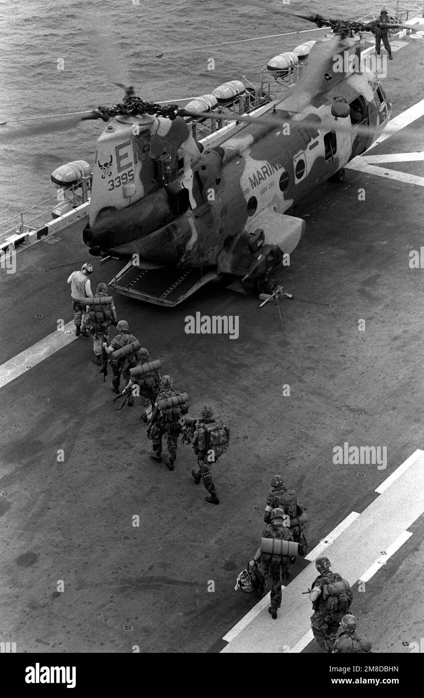 Marines of the 22nd Marine Expeditionary Unit (22nd MEU) are led to a ...
