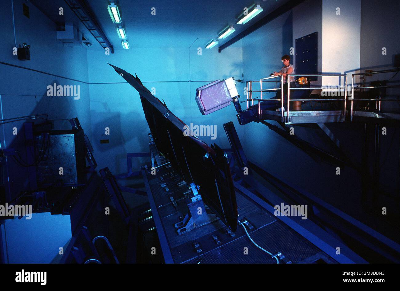 Joyce Simpson, a neutron radiographer, uses a component positioning ...