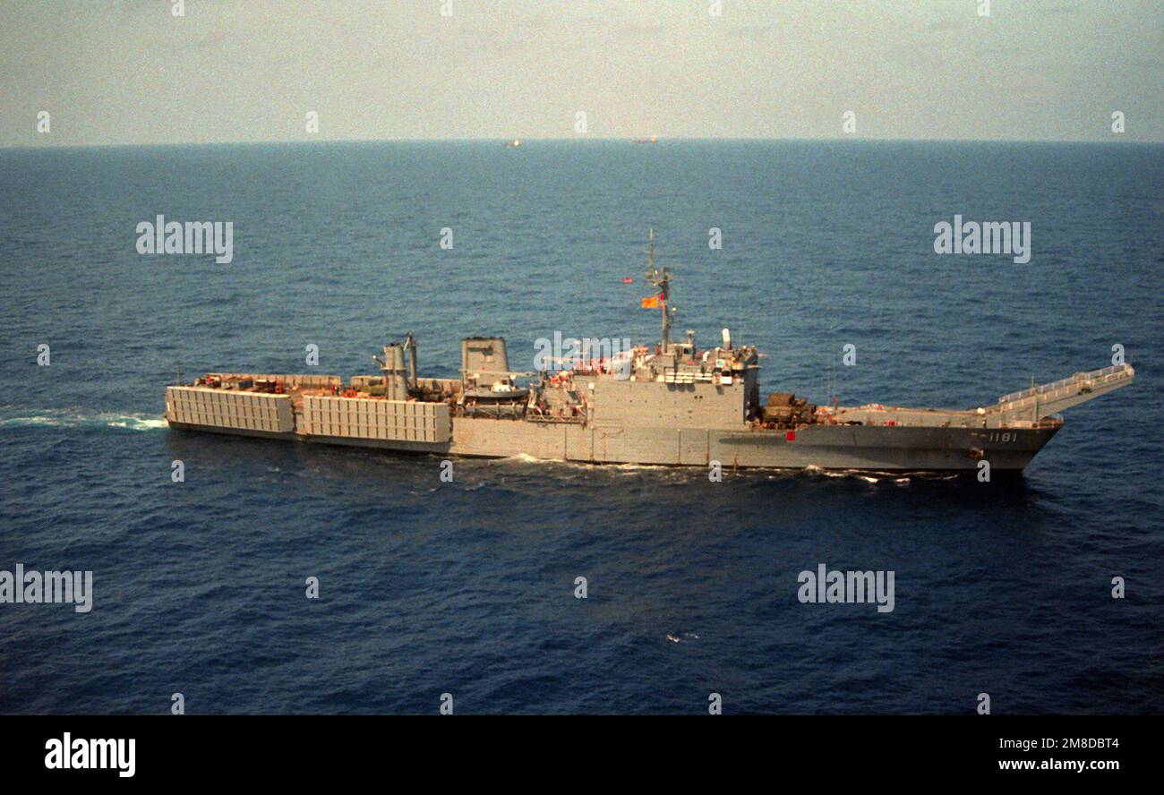A starboard beam view of the tank landing ship USS SUMTER (LST-1181 ...