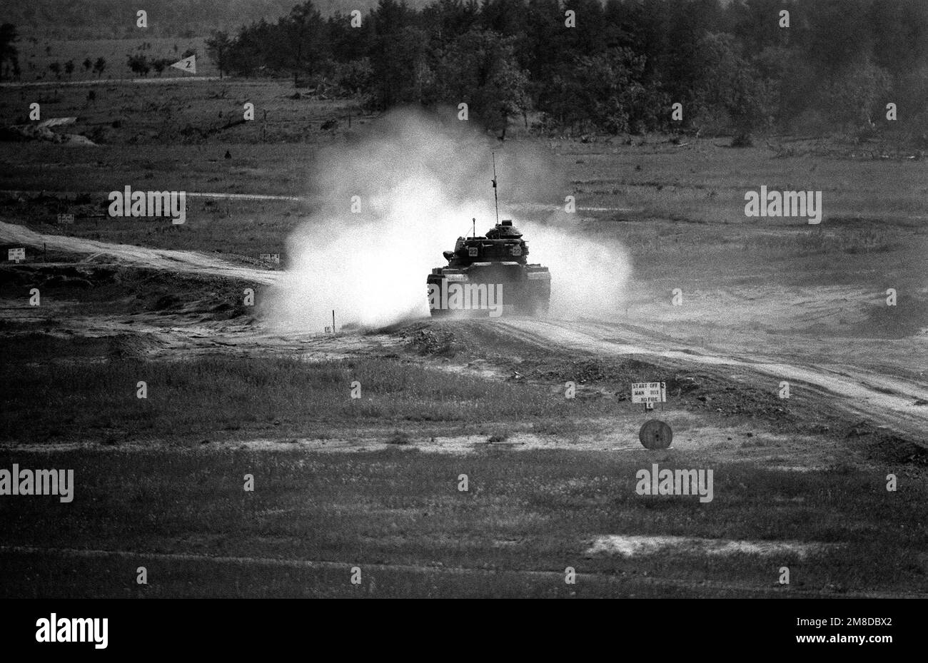 An M-60 tank from 1ST Battalion, 632nd Armor Brigade, fires a round ...