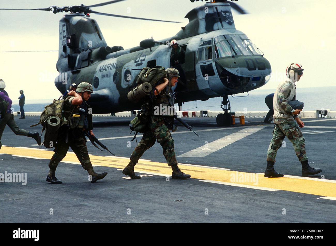 Marines of the 22nd Marine Expeditionary Unit (22nd MEU) are led to a ...
