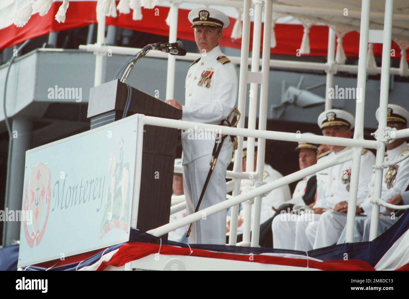 Captain Joe B. Heaton, ship's commanding officer, speaks at the ...