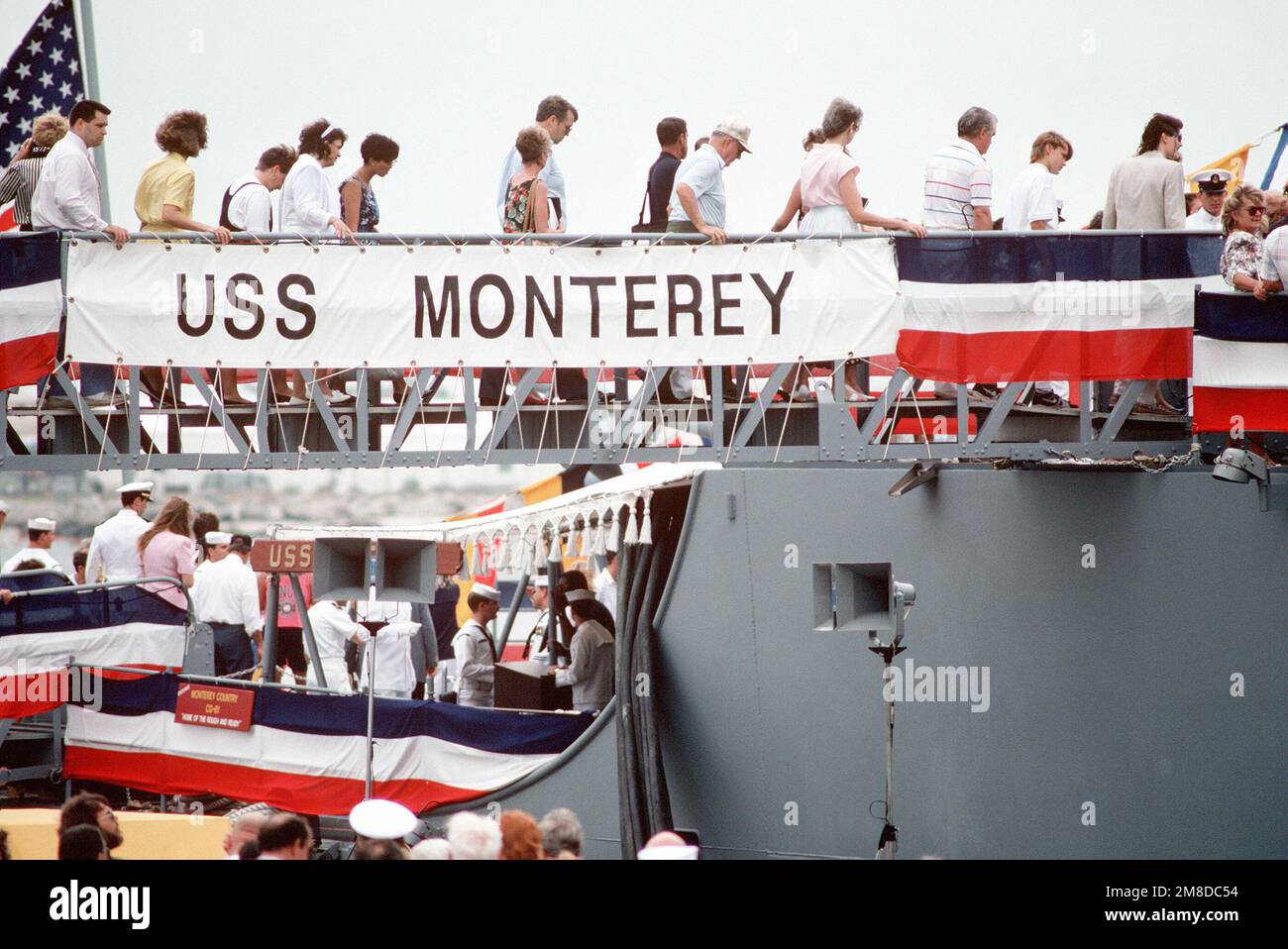 Visitors board the guided missile cruiser USS MONTEREY (CG 61) after ...