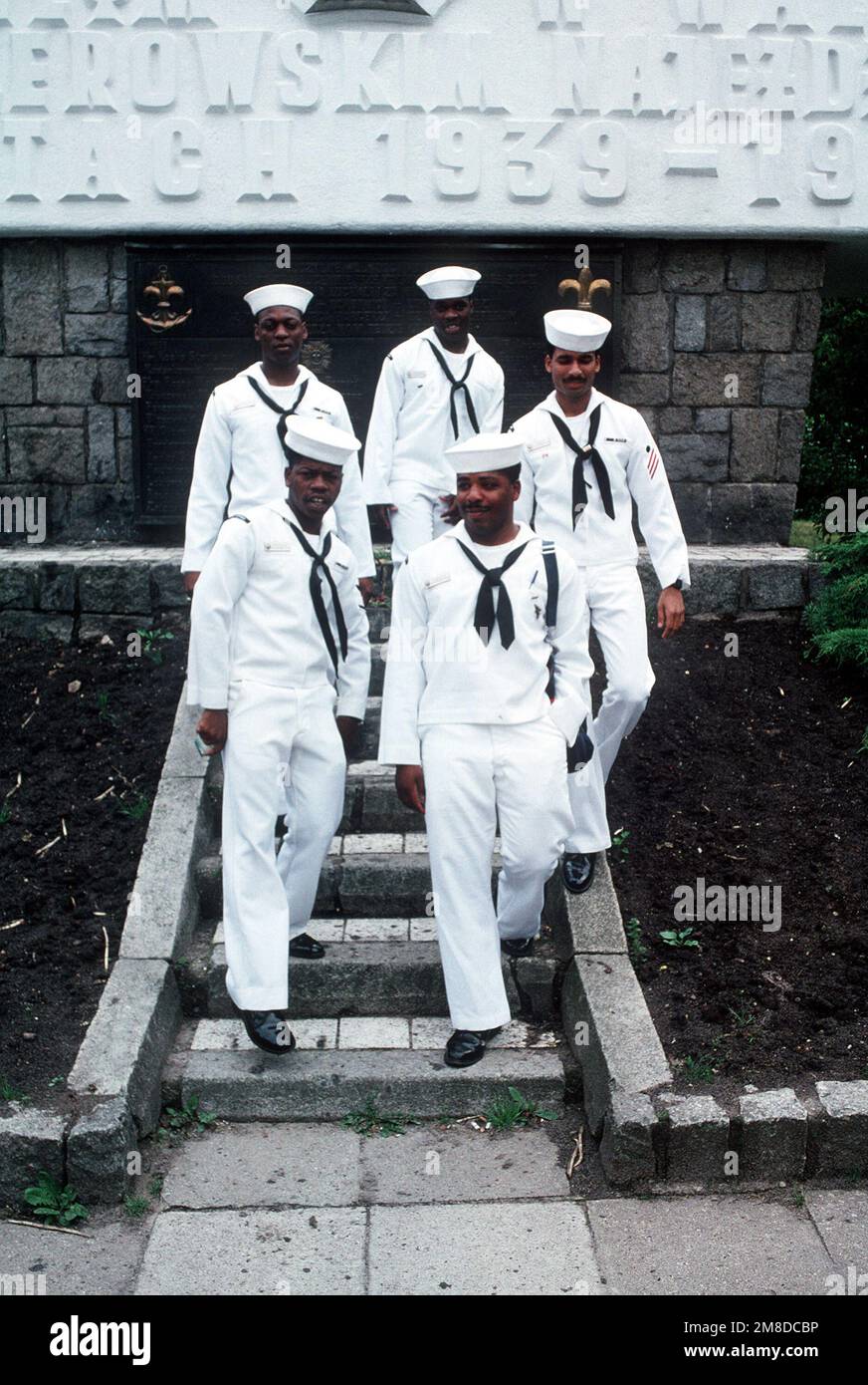 American sailors tour a local monument during a visit to the port city ...