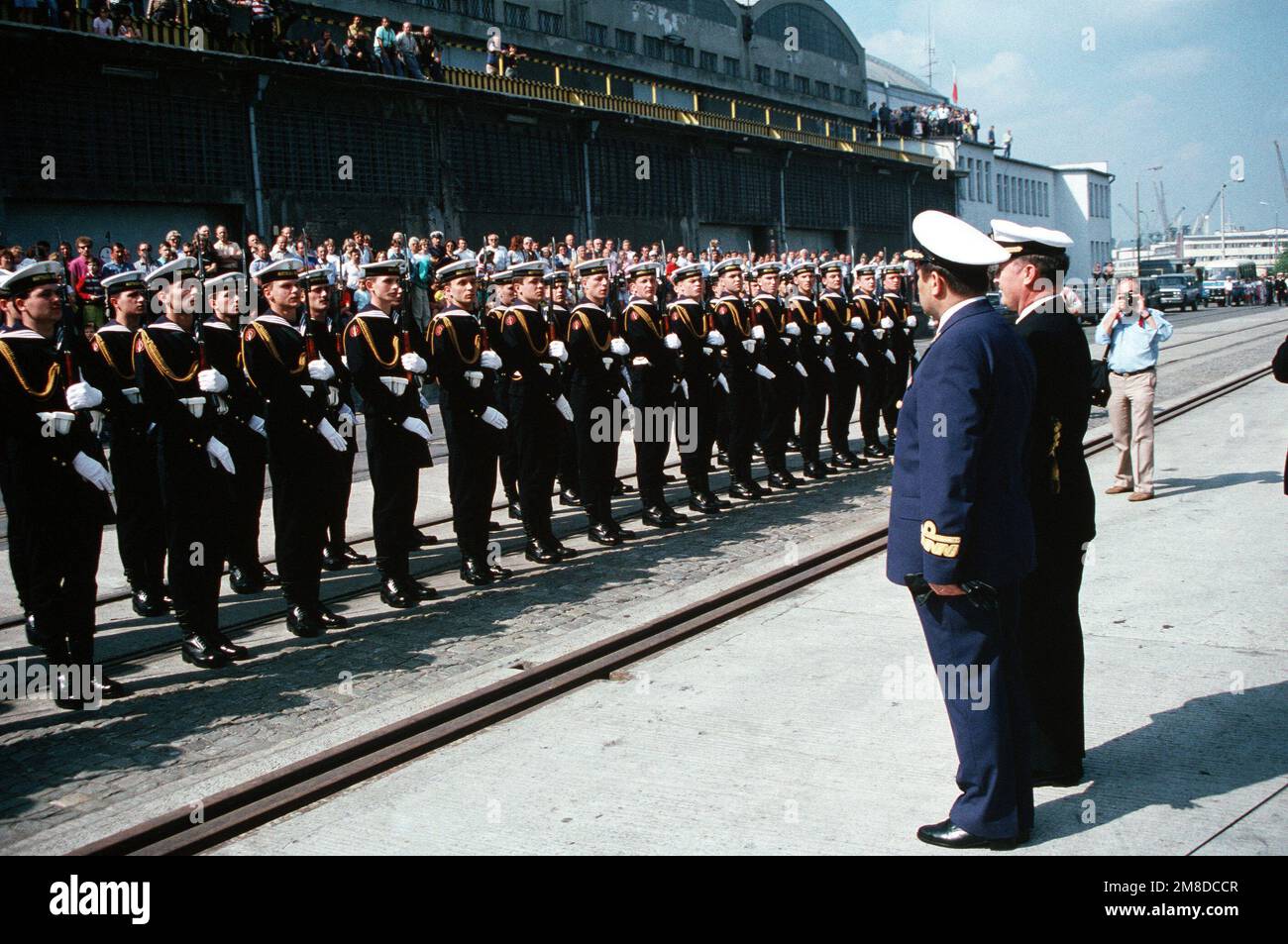 Polish sailors stand in formation on the pier during welcoming ...