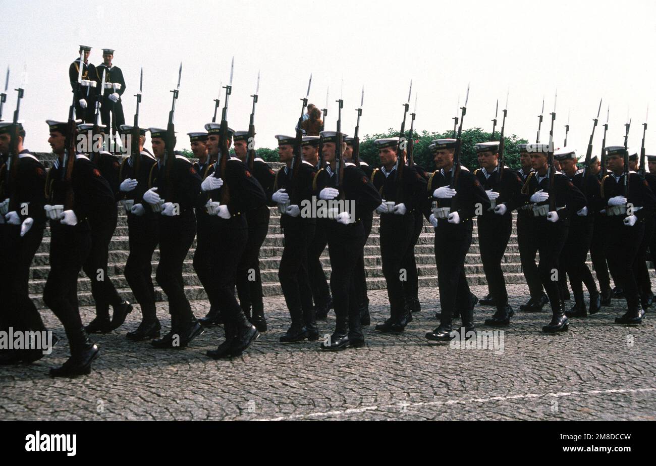 Polish sailors carrying 7.62 mm SKS self-loading rifles march in ...