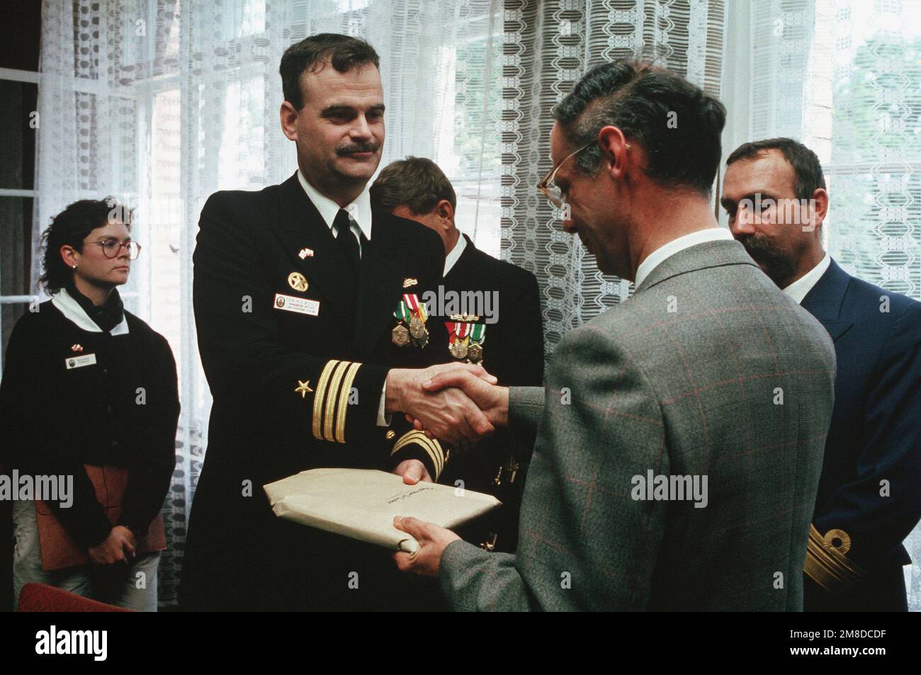 CMDR R.O. Bogle, commanding officer of the guided missile frigate USS ...