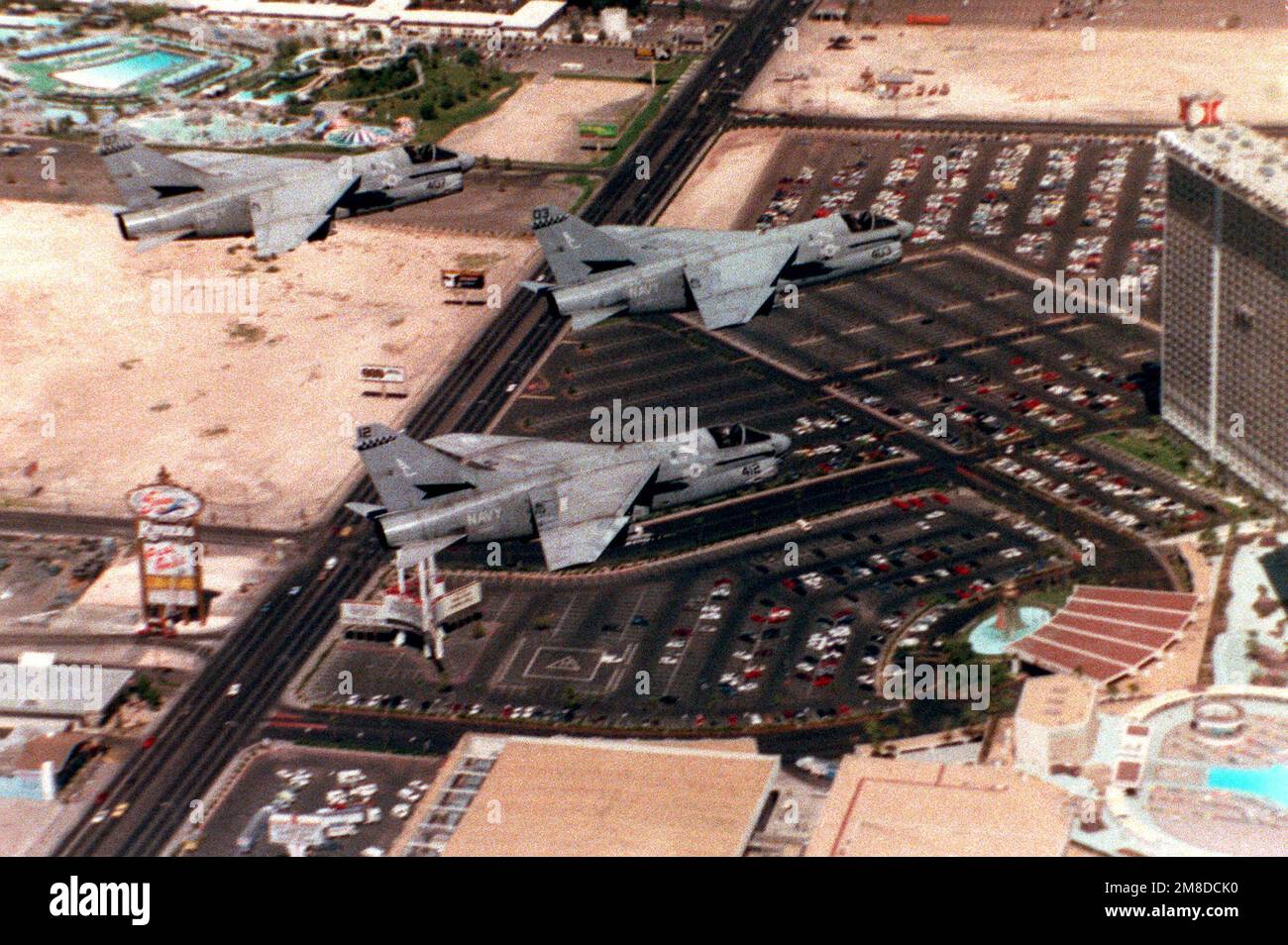 Three Attack Squadron 72 (VA 72) A-7E Corsair aircraft pass over the ...