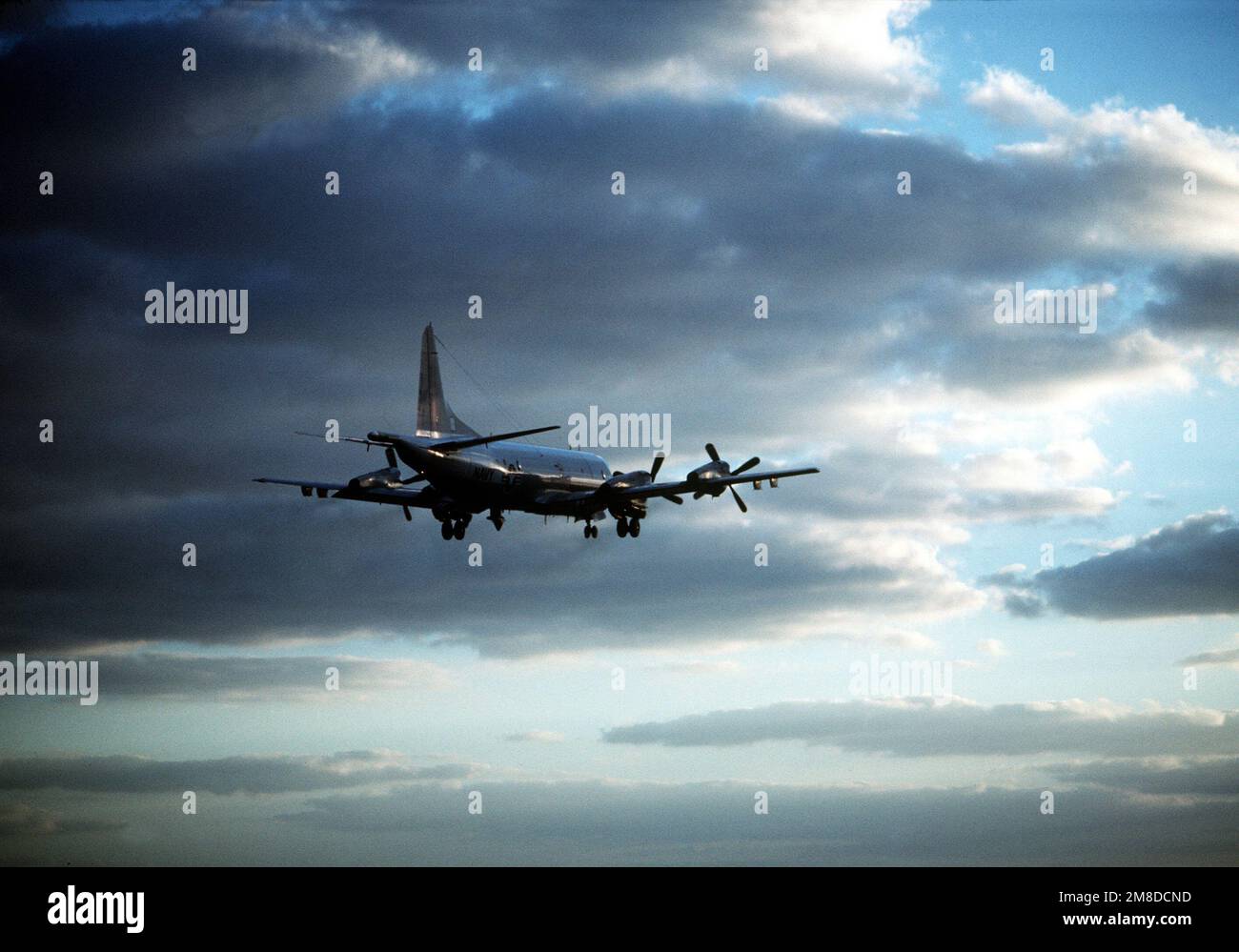 A P-3C Orion aircraft begins its descent after a Joint Task Force 4 ...