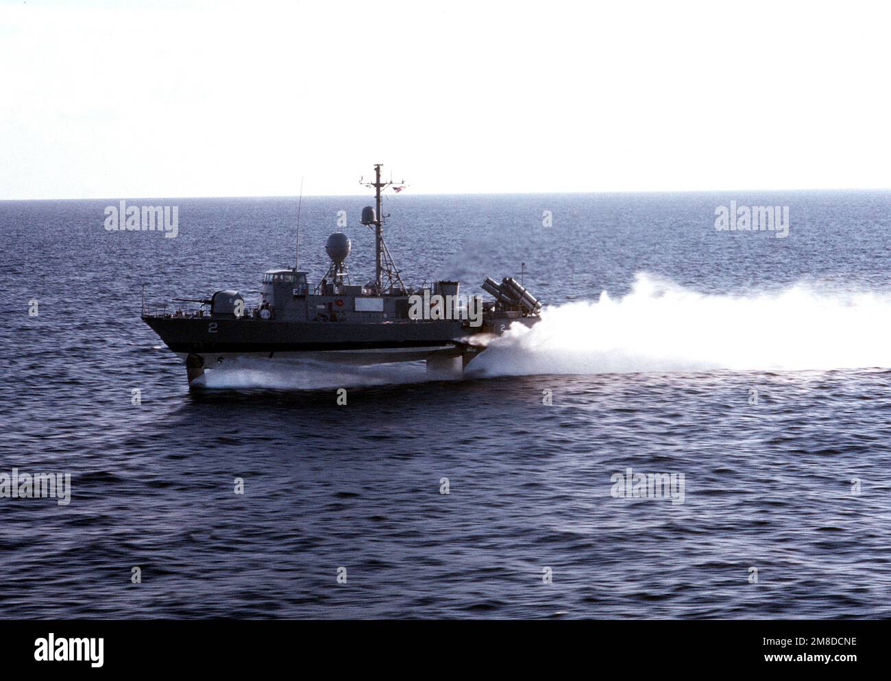 A port bow view of the hydrofoil patrol combatant missile ship USS ...