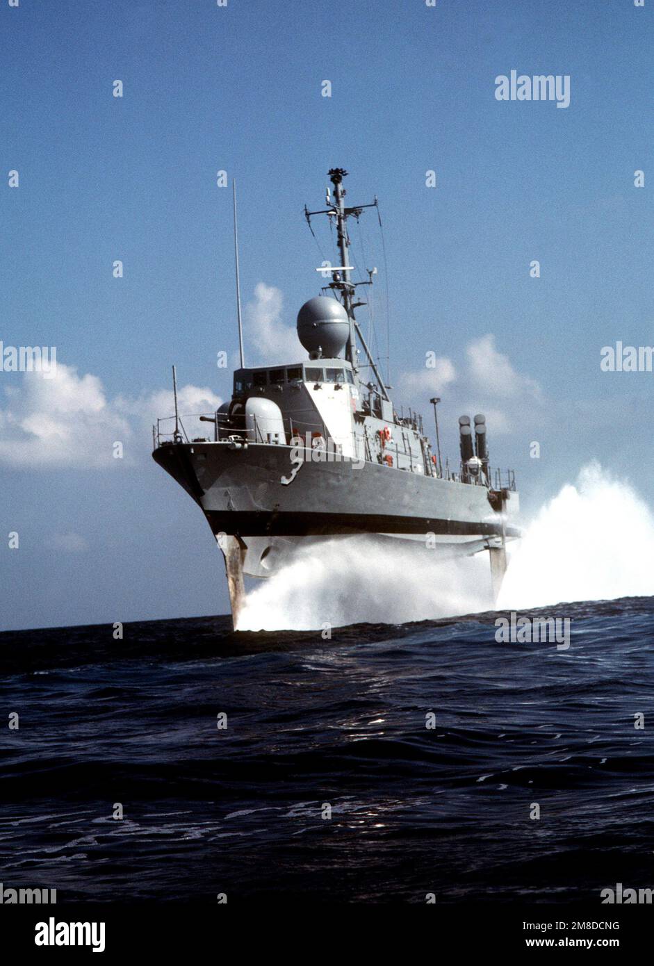 A port bow view of the hydrofoil patrol combatant missile ship USS ...