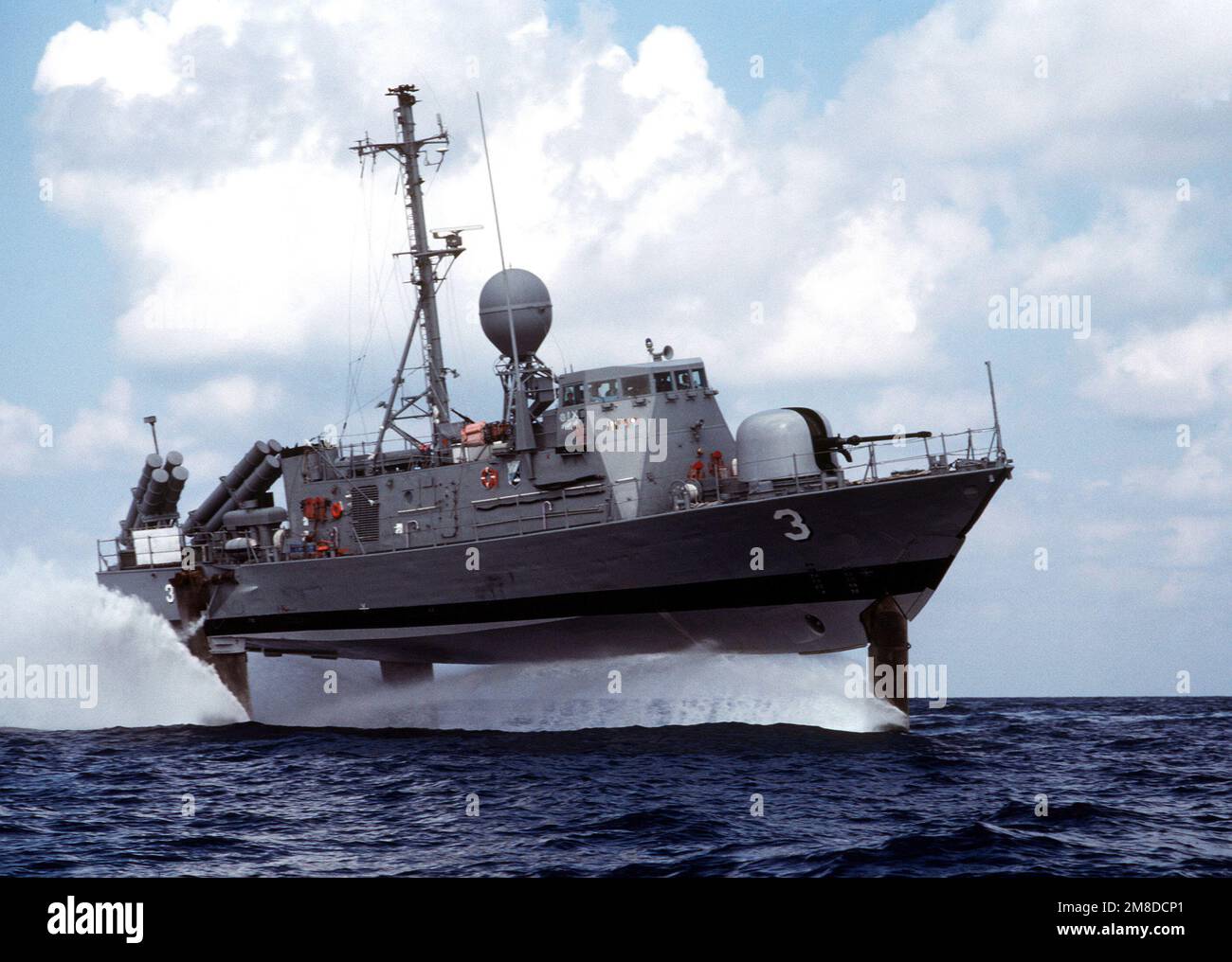 A starboard bow view of the hydrofoil patrol combatant missile ship USS ...