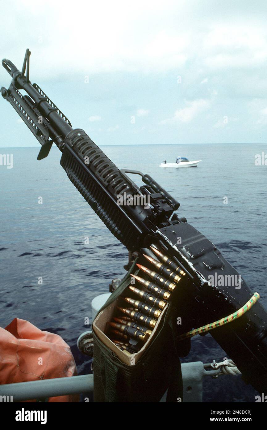 A close-up view of an M-60 machine gun mounted on a ship on a Joint ...