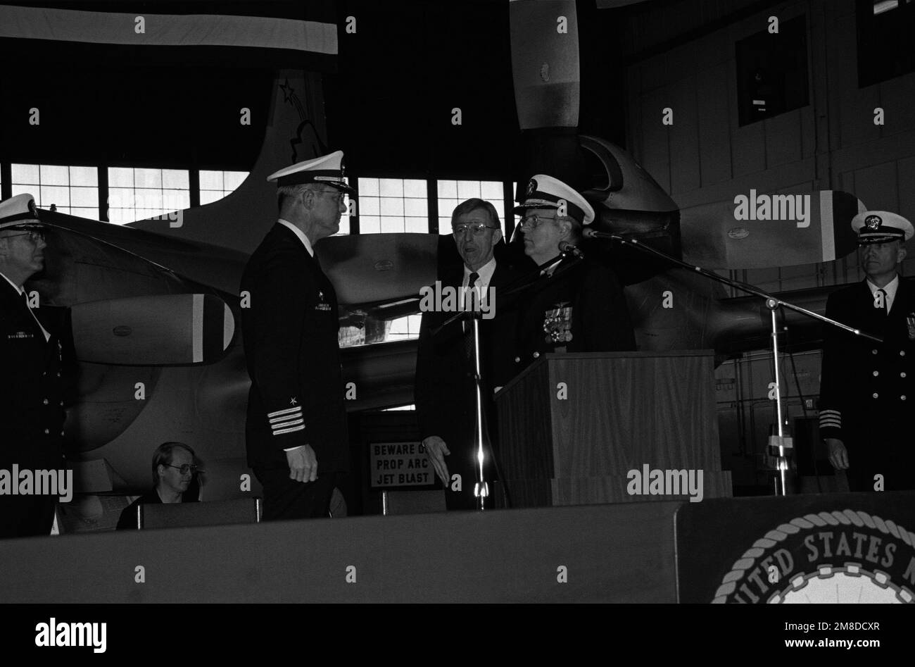 CAPT Richard E. Goolsby stands at attention during the change of ...