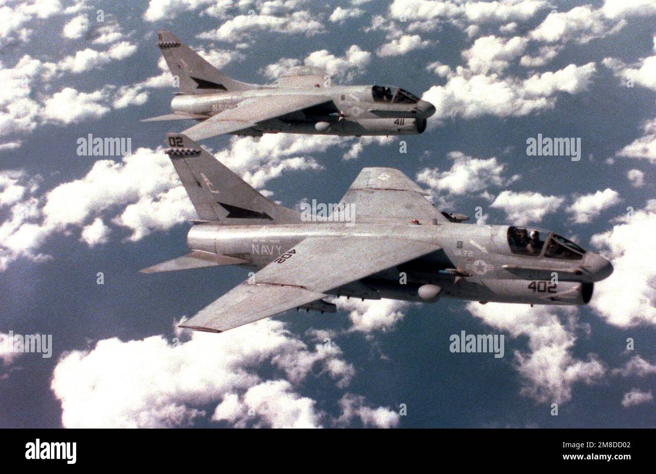 An air-to-air right side view of an two Attack Squadron 72 (VA-72) A-7E ...