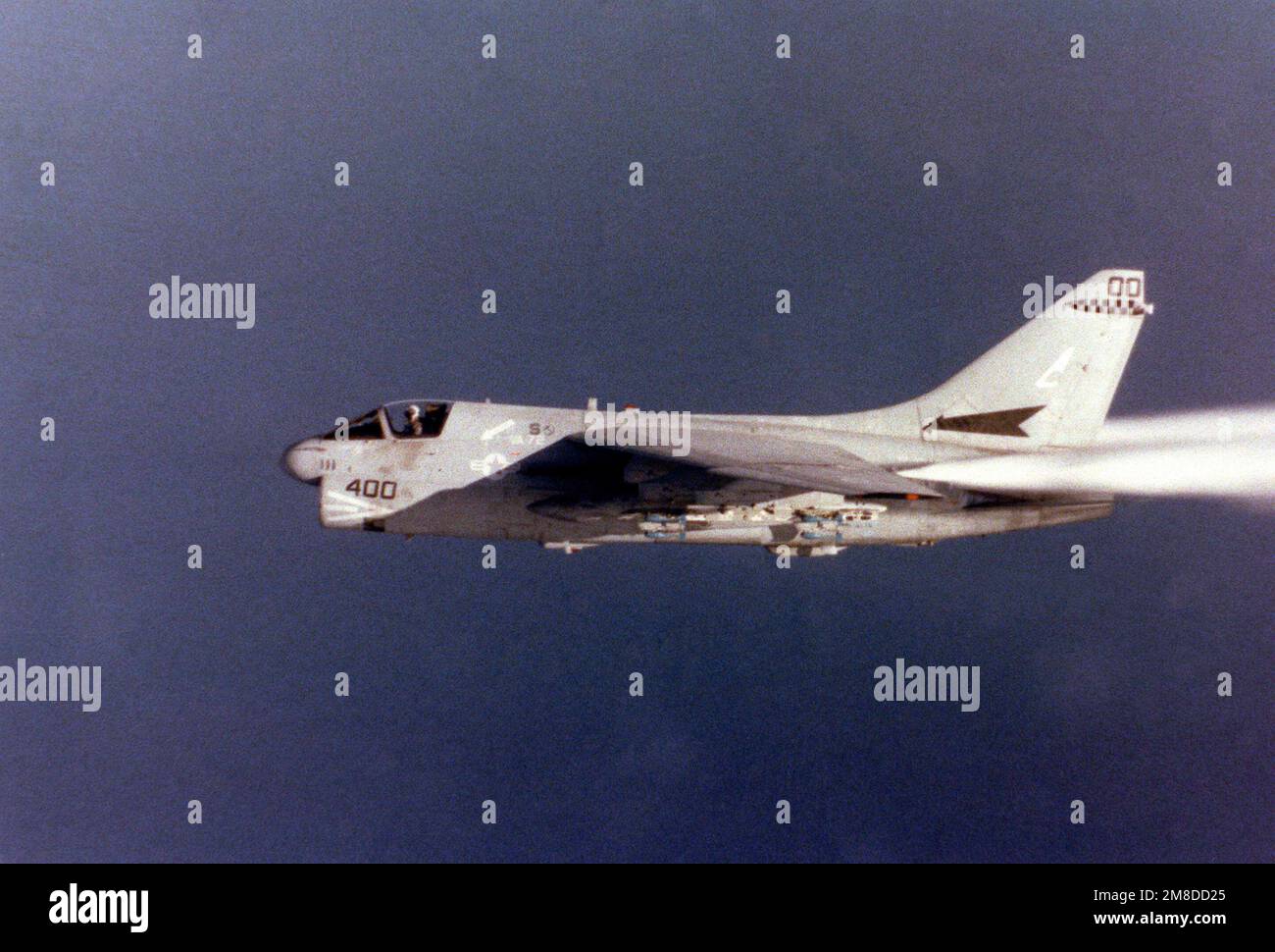 An air-to-air left side view of an Attack Squadron 72 (VA-72) A-7E ...