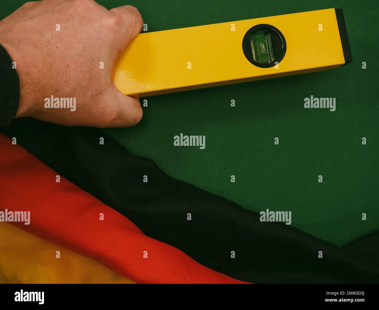 German flag and work tool on green. Concept Made in Germany. German ...