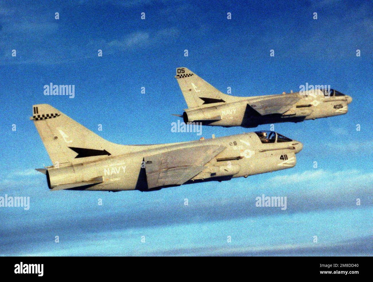 An air-to-air right side view of two Attack Squadron 72 (VA-72) A-7E ...