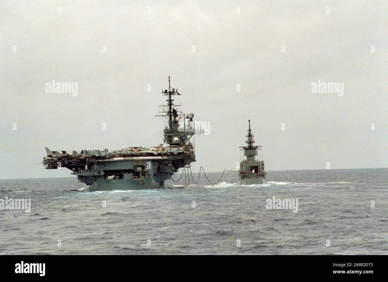 The aircraft carrier USS INDEPENDENCE (CV 62) and the frigate USS ...