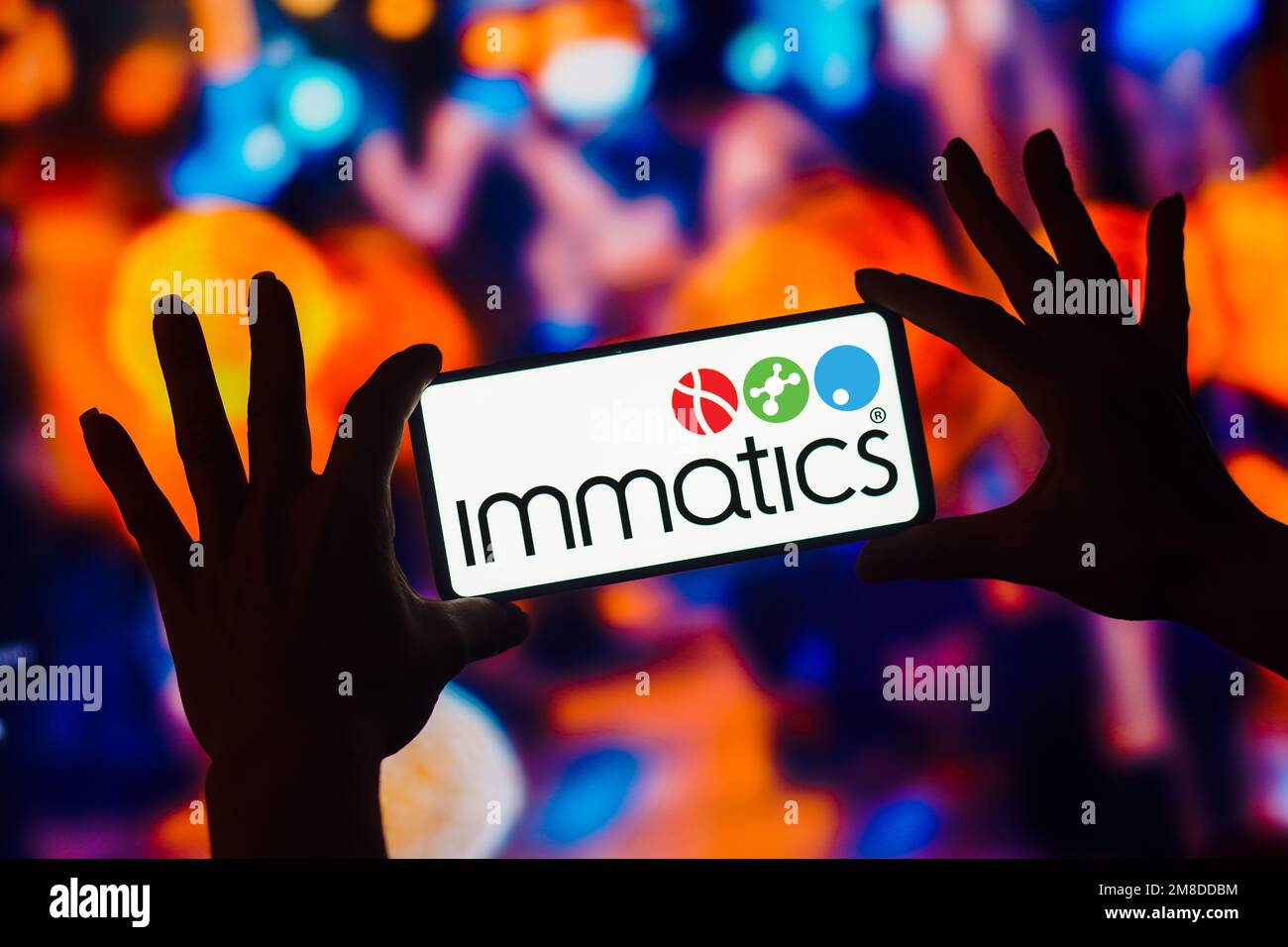 In this photo illustration, the Immatics logo is displayed on a ...