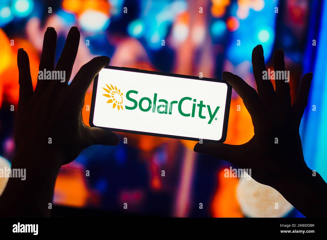 In this photo illustration, the SolarCity Corporation logo is displayed ...