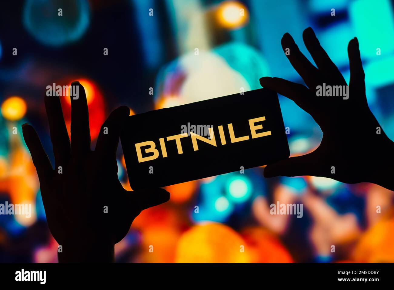 In this photo illustration, the BitNile Inc. logo is displayed on a ...