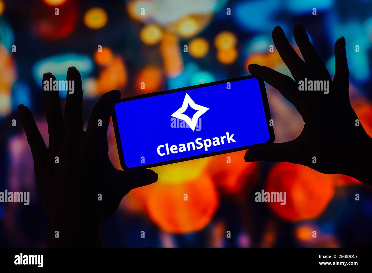 In this photo illustration, the CleanSpark logo is displayed on a ...
