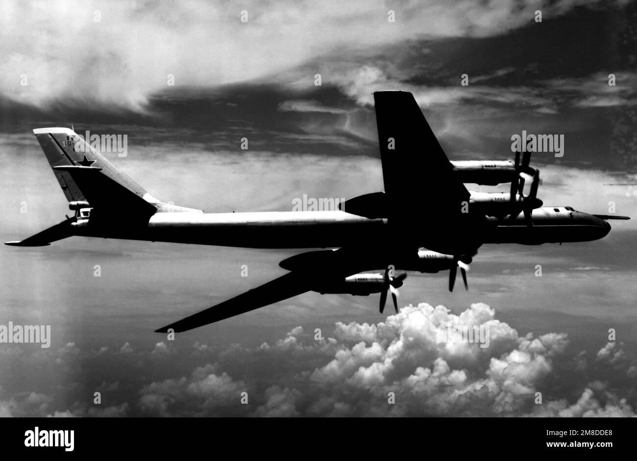 A air-to-air right side view of a Soviet Tu-142 Bear F aircraft ... A air-to-air right side view of a Soviet Tu-142 Bear F aircraft ...