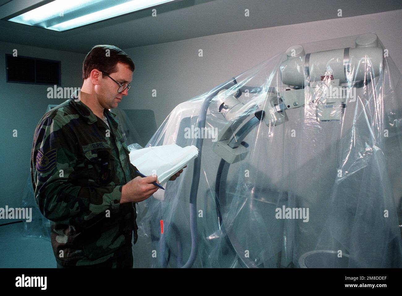 TECH. SGT. Ervin Burke takes an inventory of equipment at the 652nd U.S ...