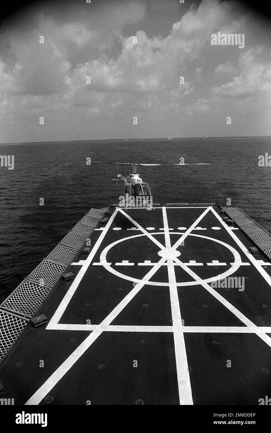 A Training Wing 5 (TAW-5) TH-57 Sea Ranger helicopter hovers over the ...