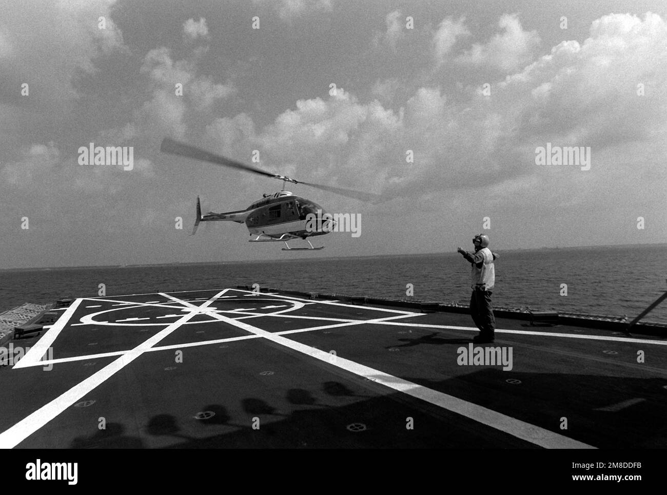 A landing signal enlistedman (LSE) directs a Training Wing 5 (TAW-5) TH ...