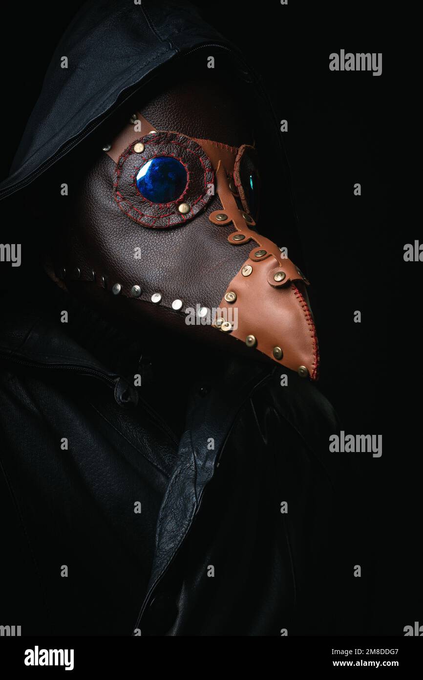 Plague doctor with crow-like mask isolated on black background Creepy ...