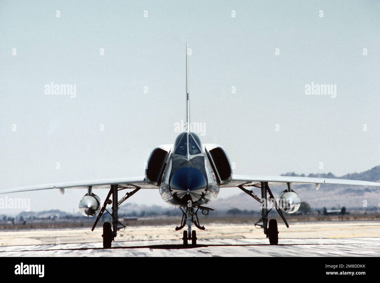 An F-106A Delta Dart aircraft rolls along a taxiway at Rockwell ...