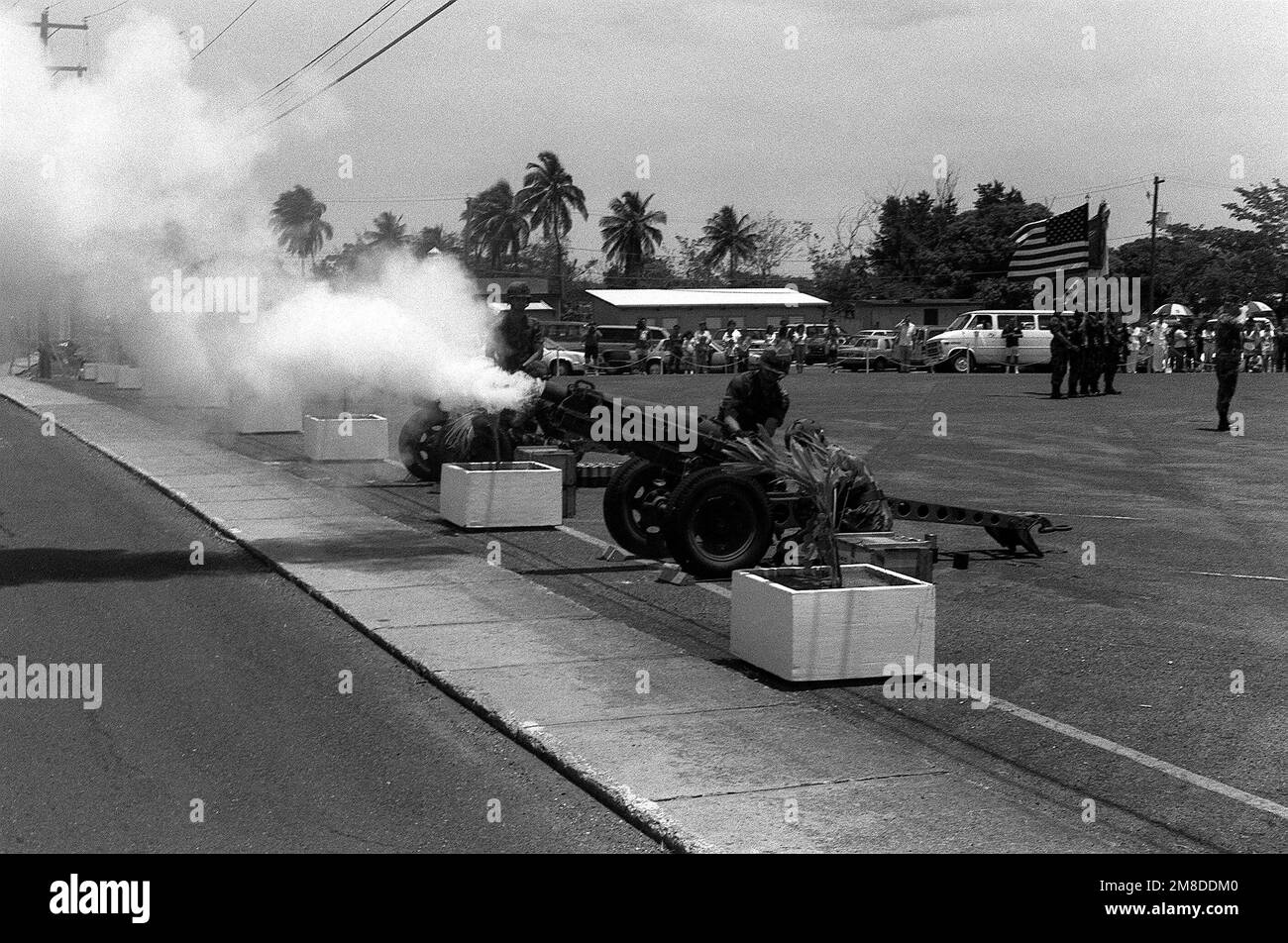Two M-120 75mm saluting guns are used to fire a 50-gun salute during ...