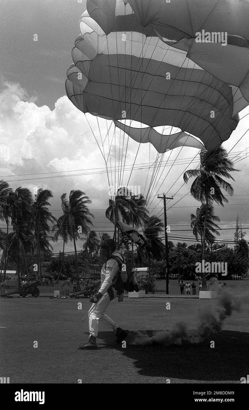 Command SGT. MAJ. Luis J. Gutierrez lands safely after a parachute ...