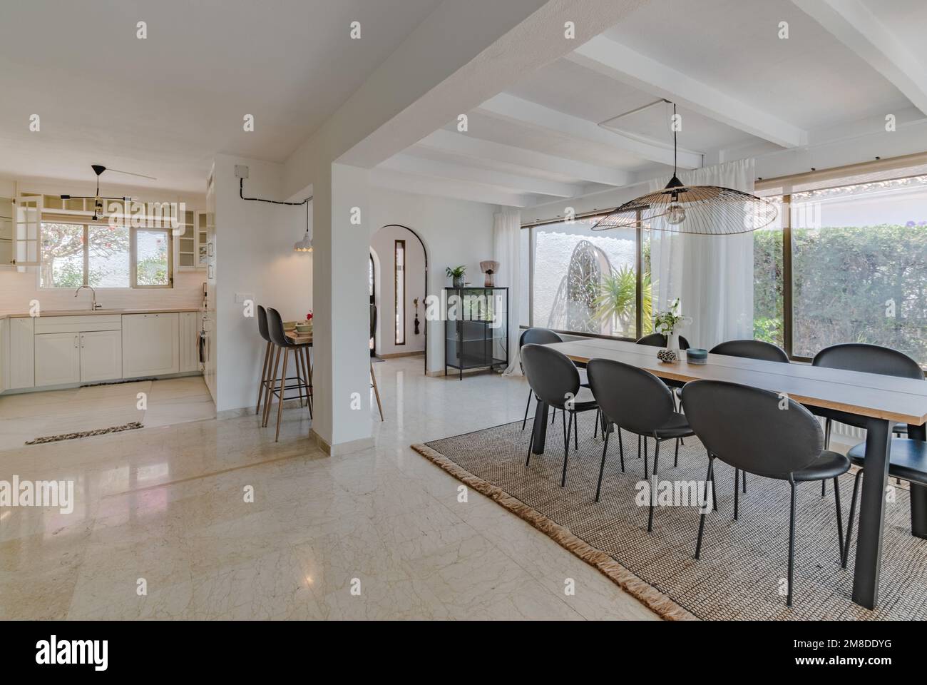 a open plan double dining and kitchen area in a luxury chalet along the ...