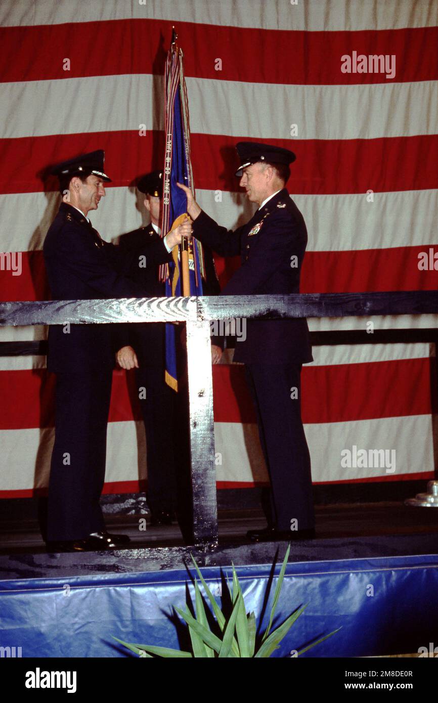COL Carleton accepts the wing flag from MGEN Marcus A. Anderson ...