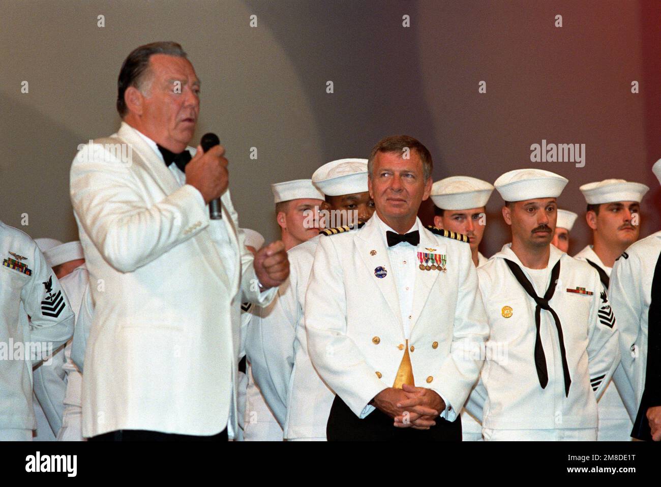 Captain J.J. Dantone, center, Commanding Officer of the nuclear-powered ...