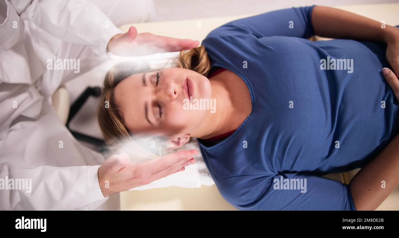 Reiki Therapy Alternative Healing Massage For Man Stock Photo - Alamy
