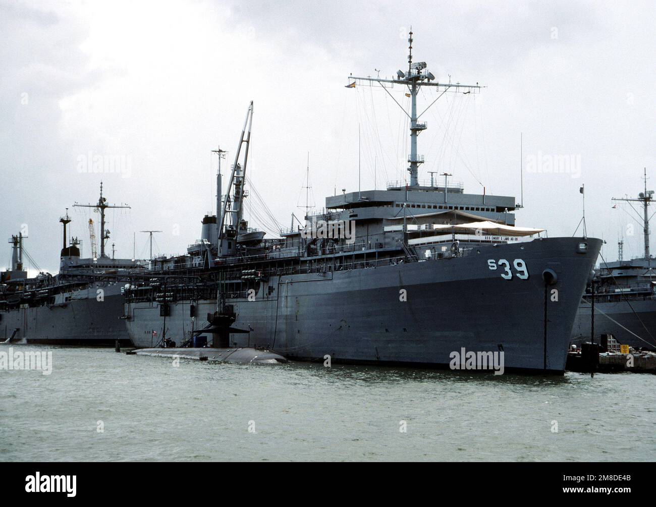 A starboard bow view of the submarine tender USS EMORY S. LAND (AS 39 ...