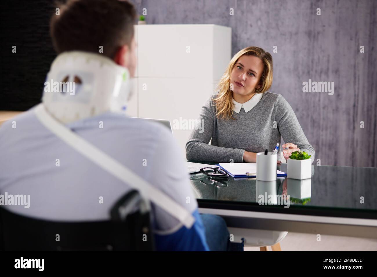 Injury Compensation Court Claim Application With Lawyer Stock Photo - Alamy