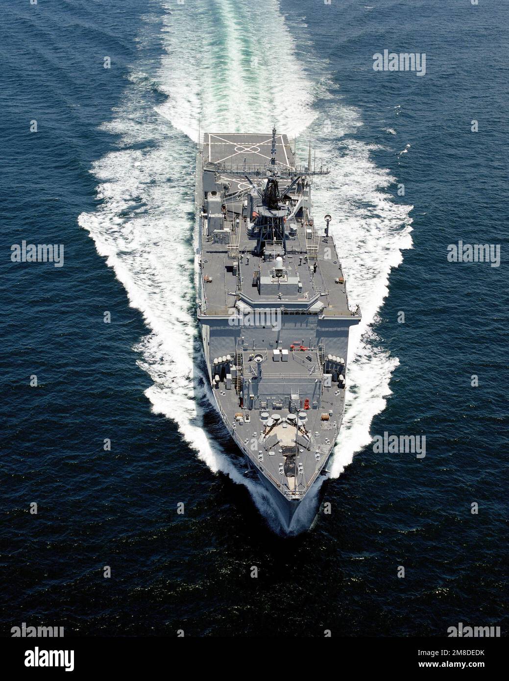 An overhead bow view of the dock landing ship TORTUGA (LSD 46) underway ...