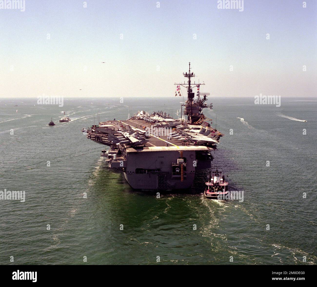A stern-on view of the aircraft carrier USS RANGER (CV-61), with ...